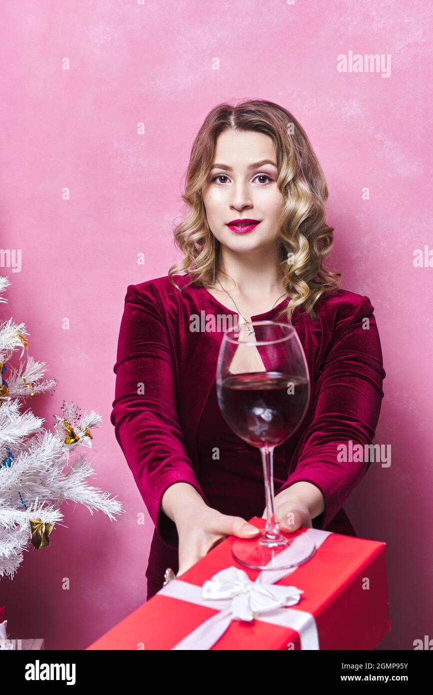 beautiful woman giving box christmas present Stock Photo - Alamy