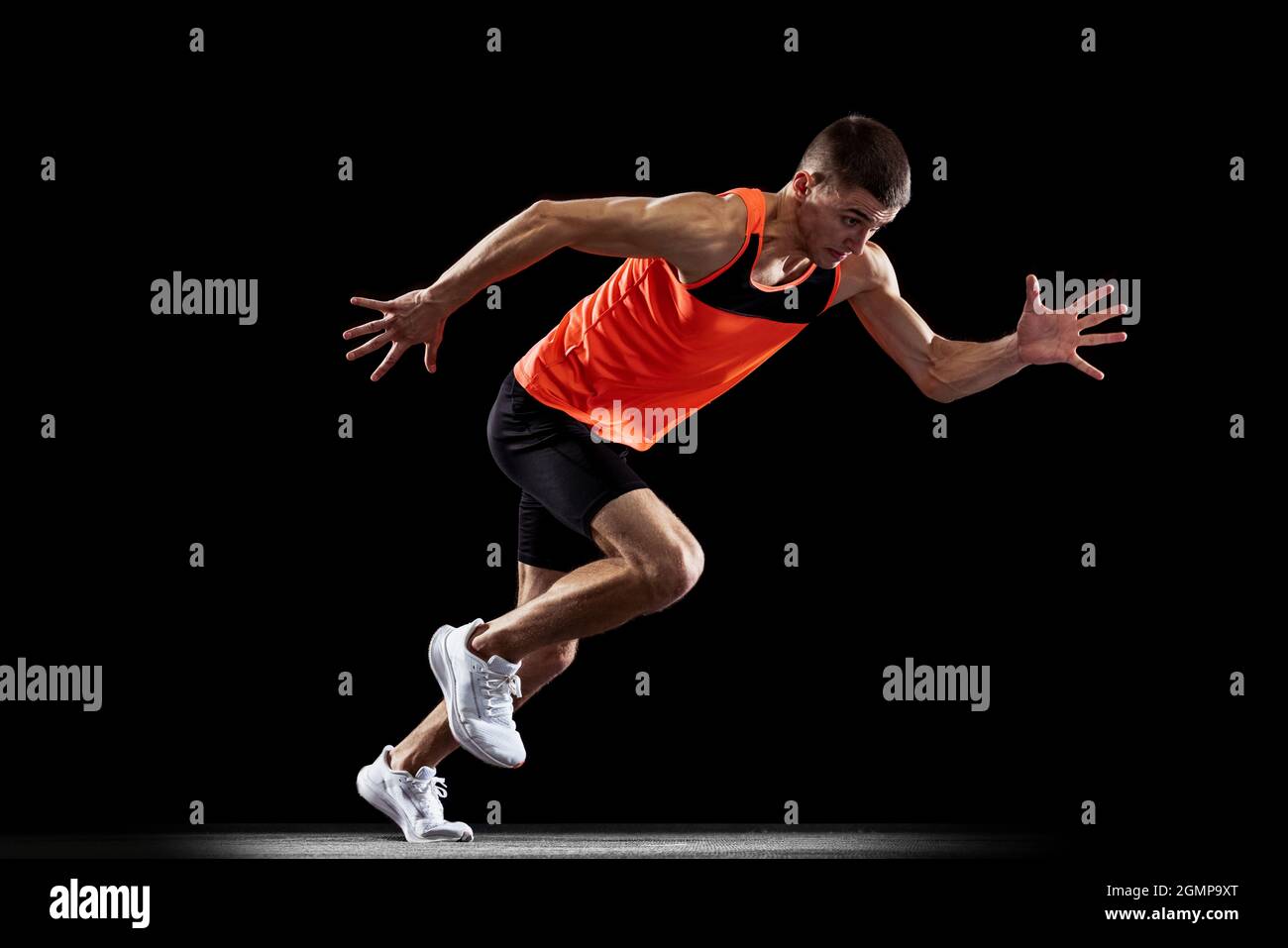 Full-length back view portrait of young male professional athlete ...