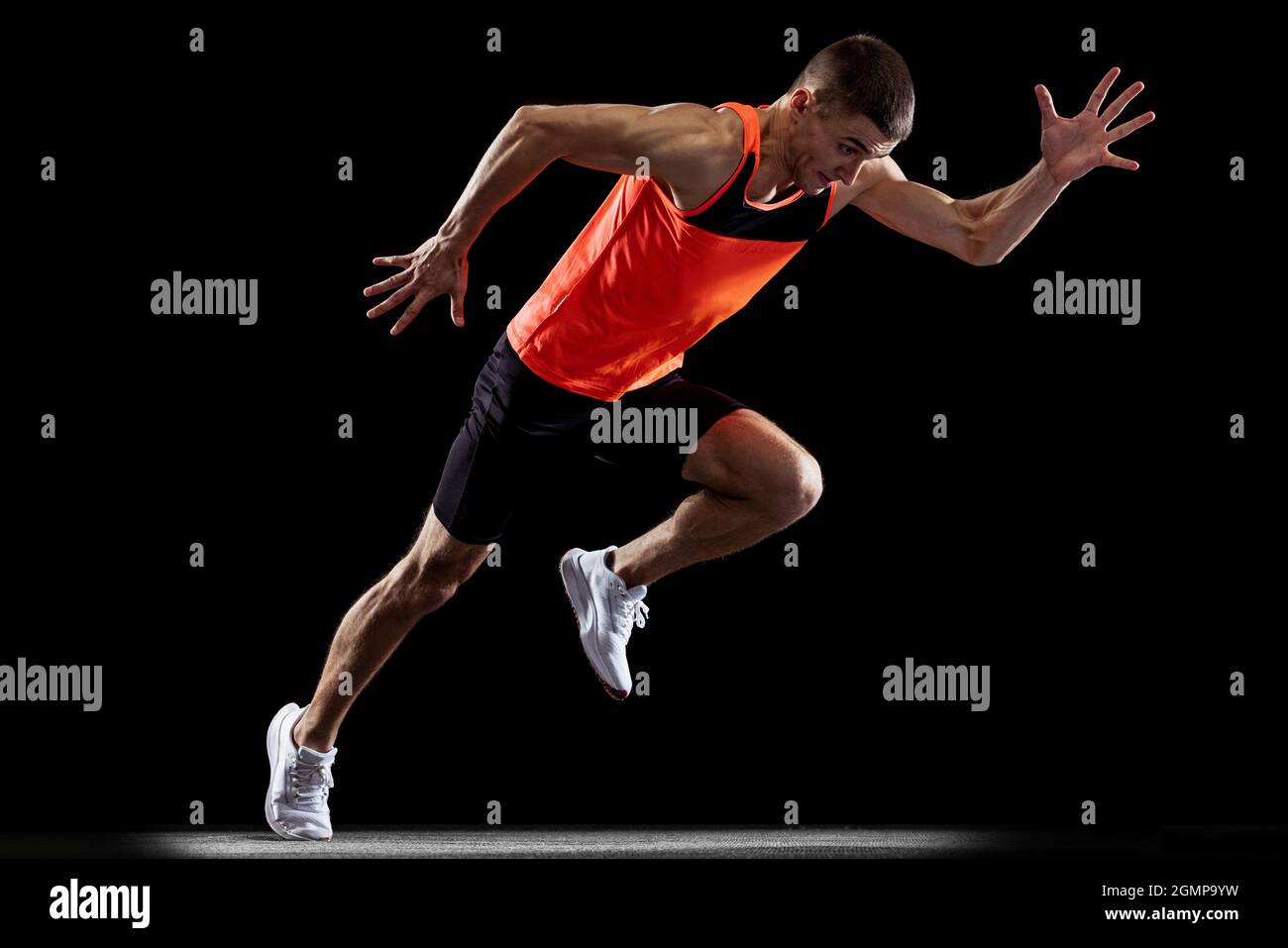 Full-length back view portrait of young male professional athlete ...
