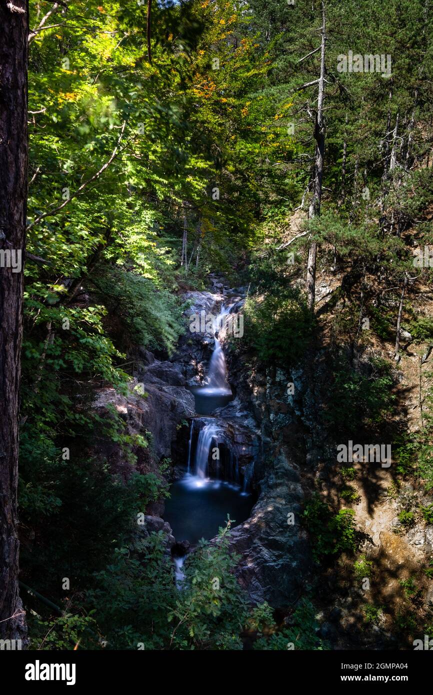 Triple waterfall in wooded landscape. Waterfall in a Forest nature park ...