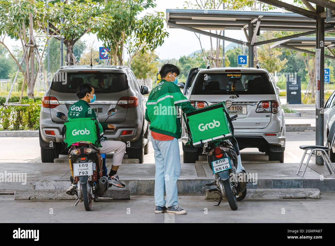 KANCHANABURI, THAILAND-AUGUST 22,2021 : Group of Grab riders park ...