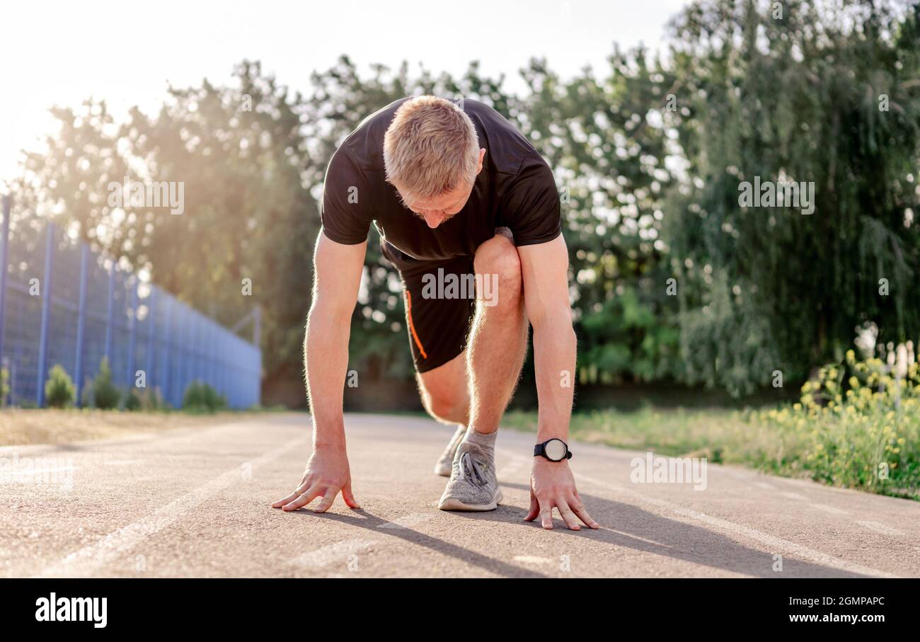 Strong man doing stretch hi-res stock photography and images - Alamy