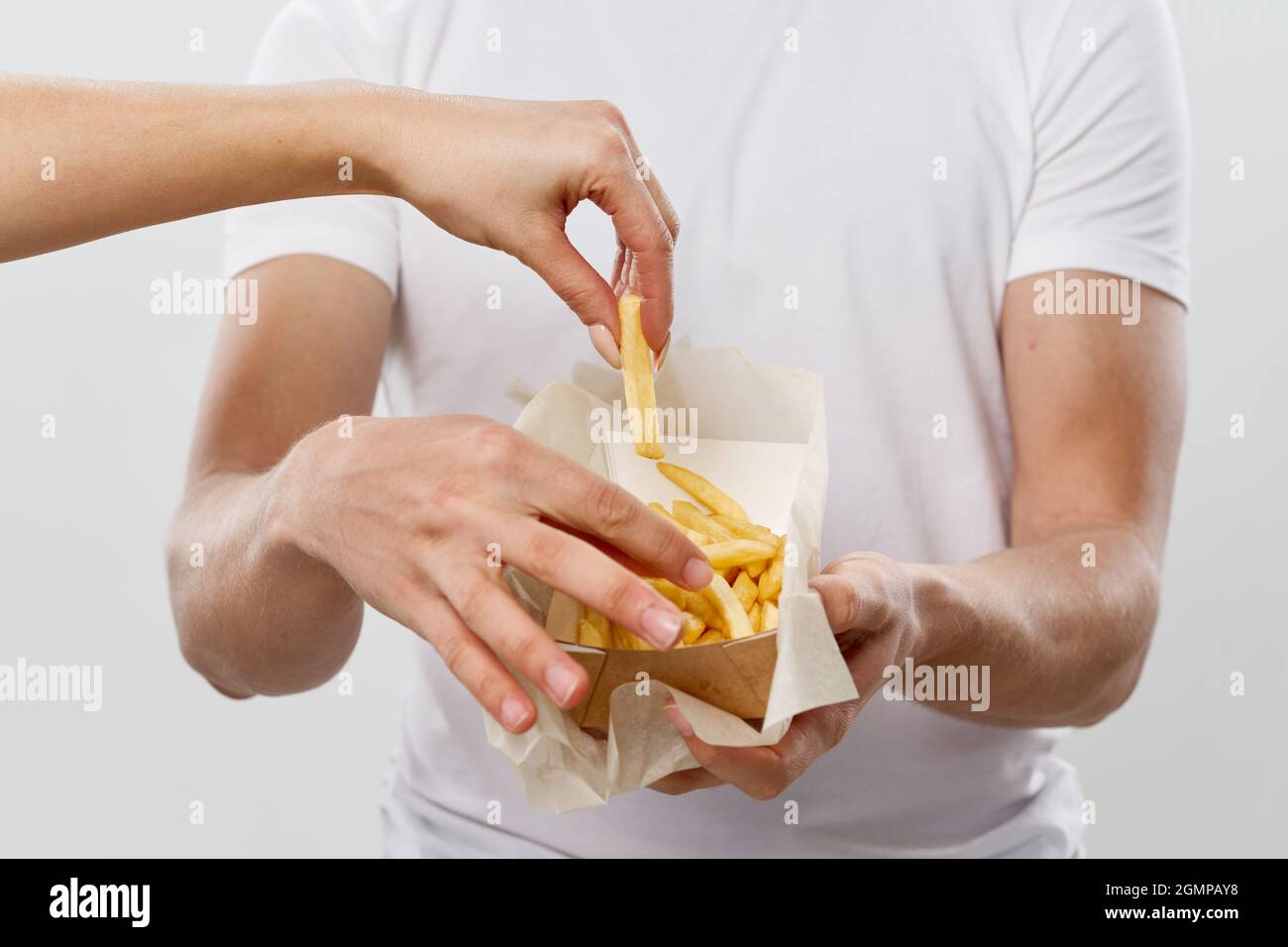 fast food french fries snack lifestyle light background Stock Photo - Alamy