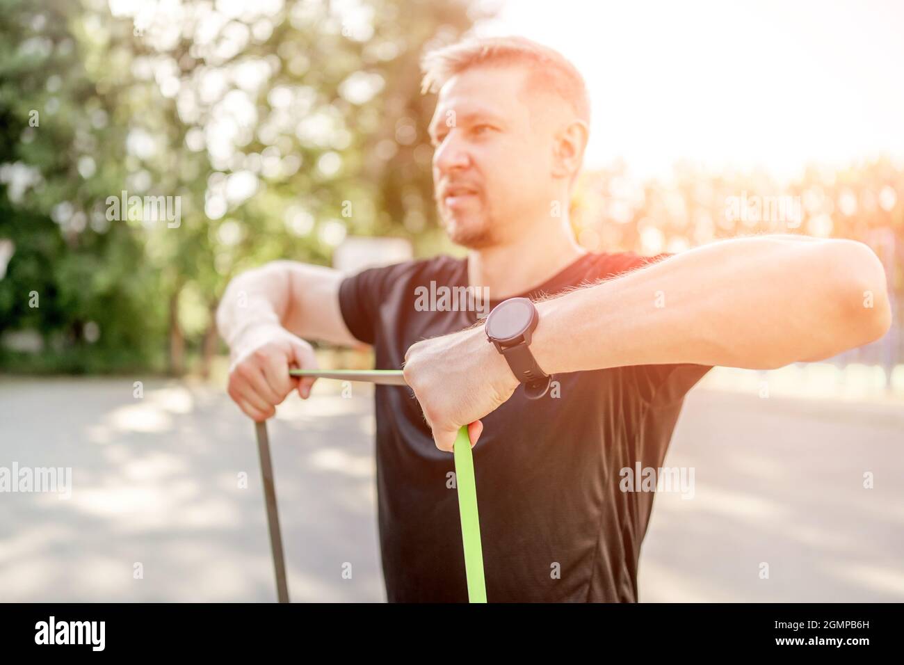 Man doing workout outdoors Stock Photo - Alamy