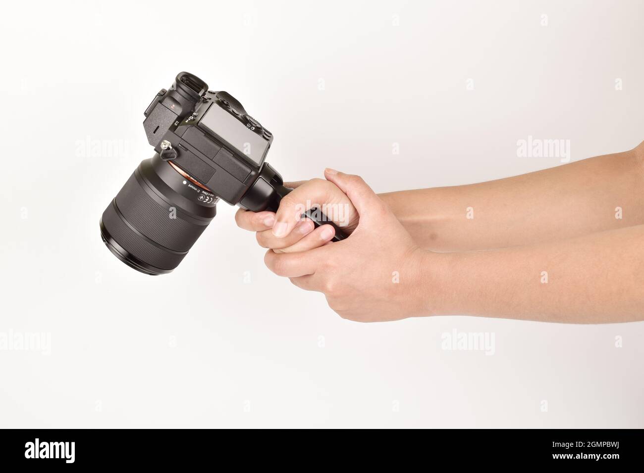 Low Angle Shooting With Digital Camera, Hand Holding Digital Camera ...