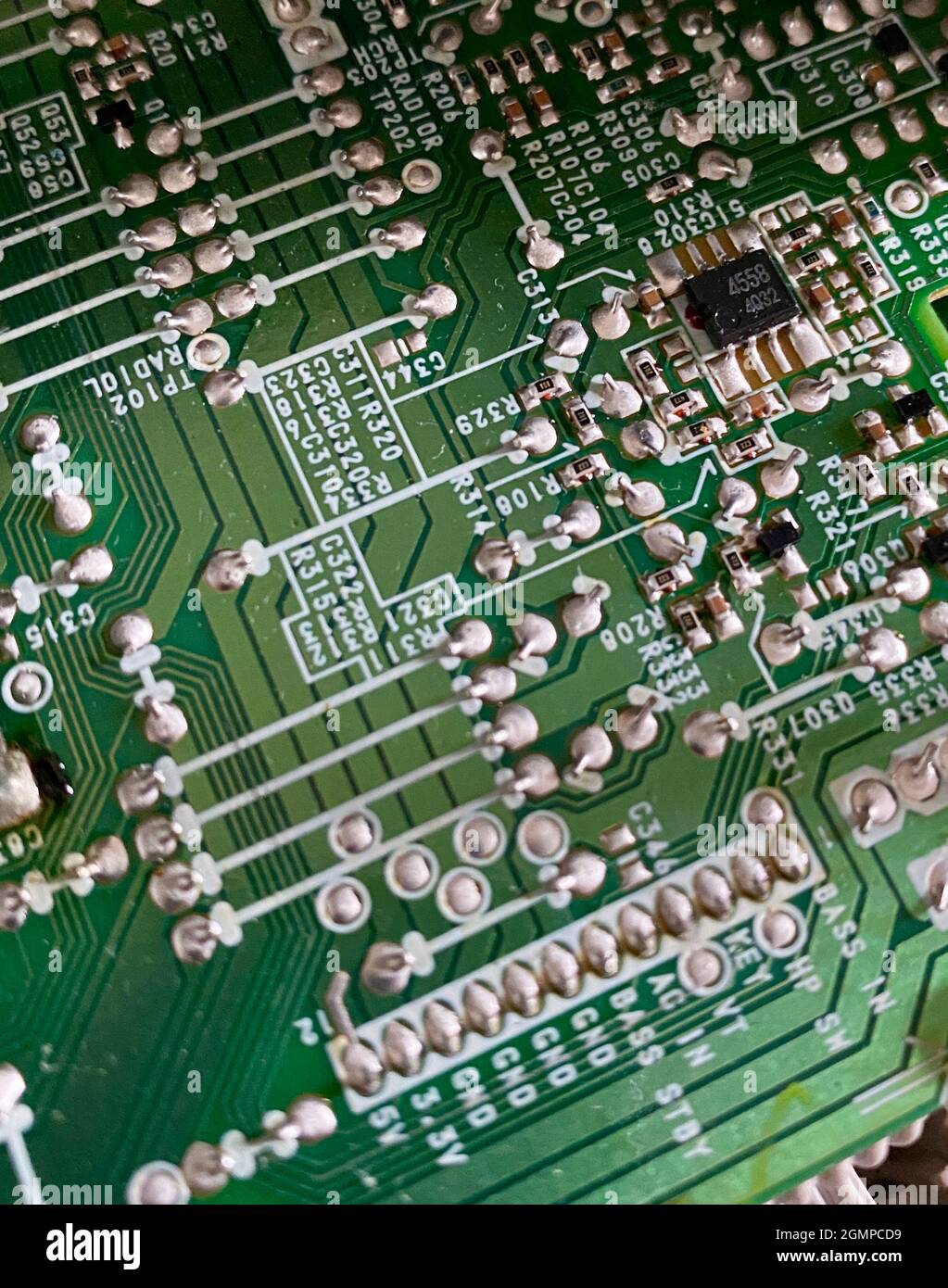 Up close view of a circuit board from inside a digital alarm clock ...