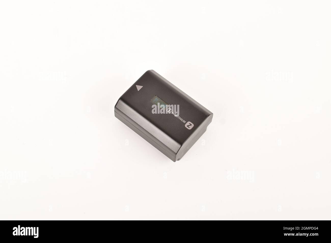 Camera battery on white background Stock Photo - Alamy