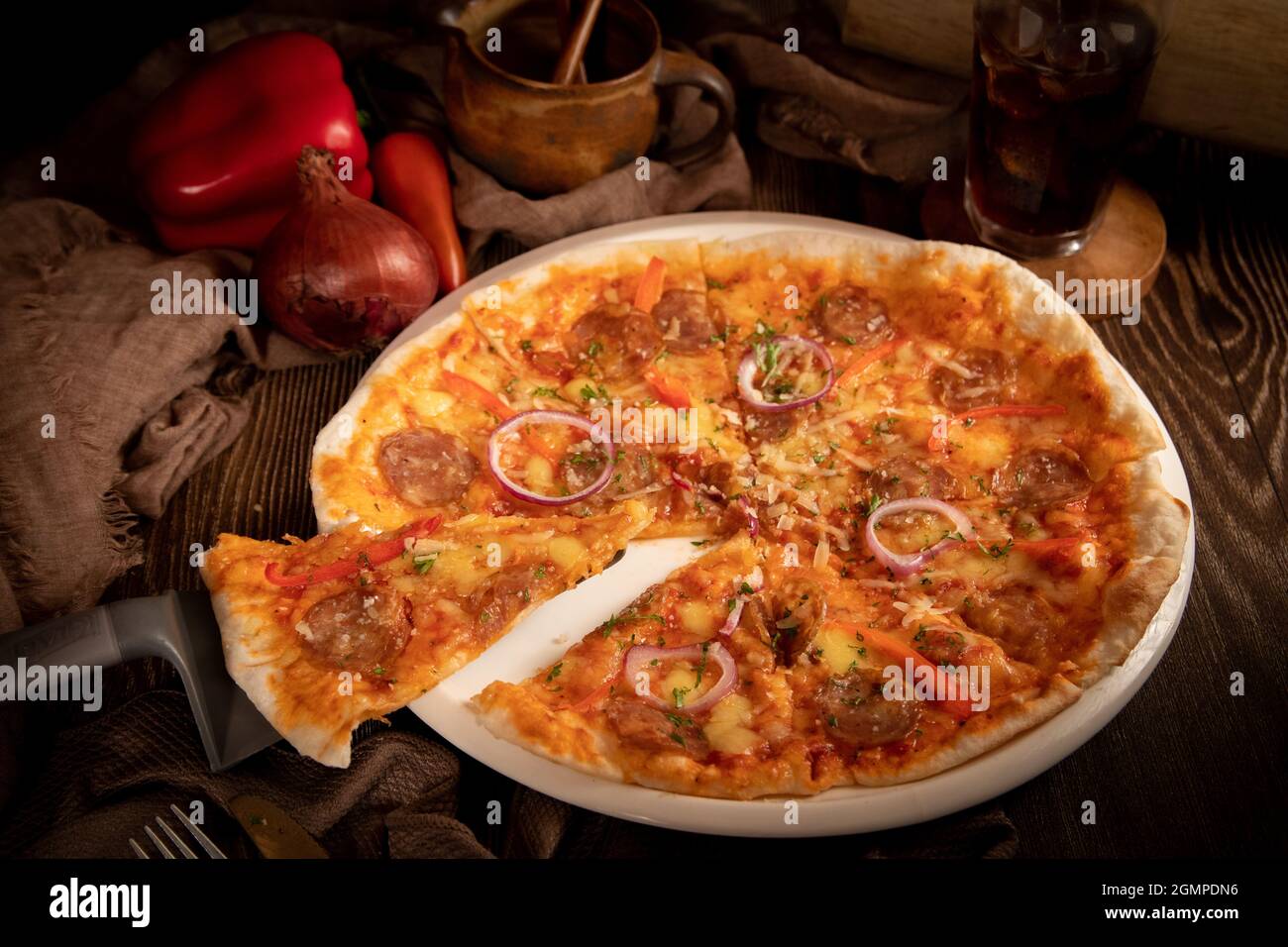 Italian tasty pizza in a kitchen Stock Photo - Alamy