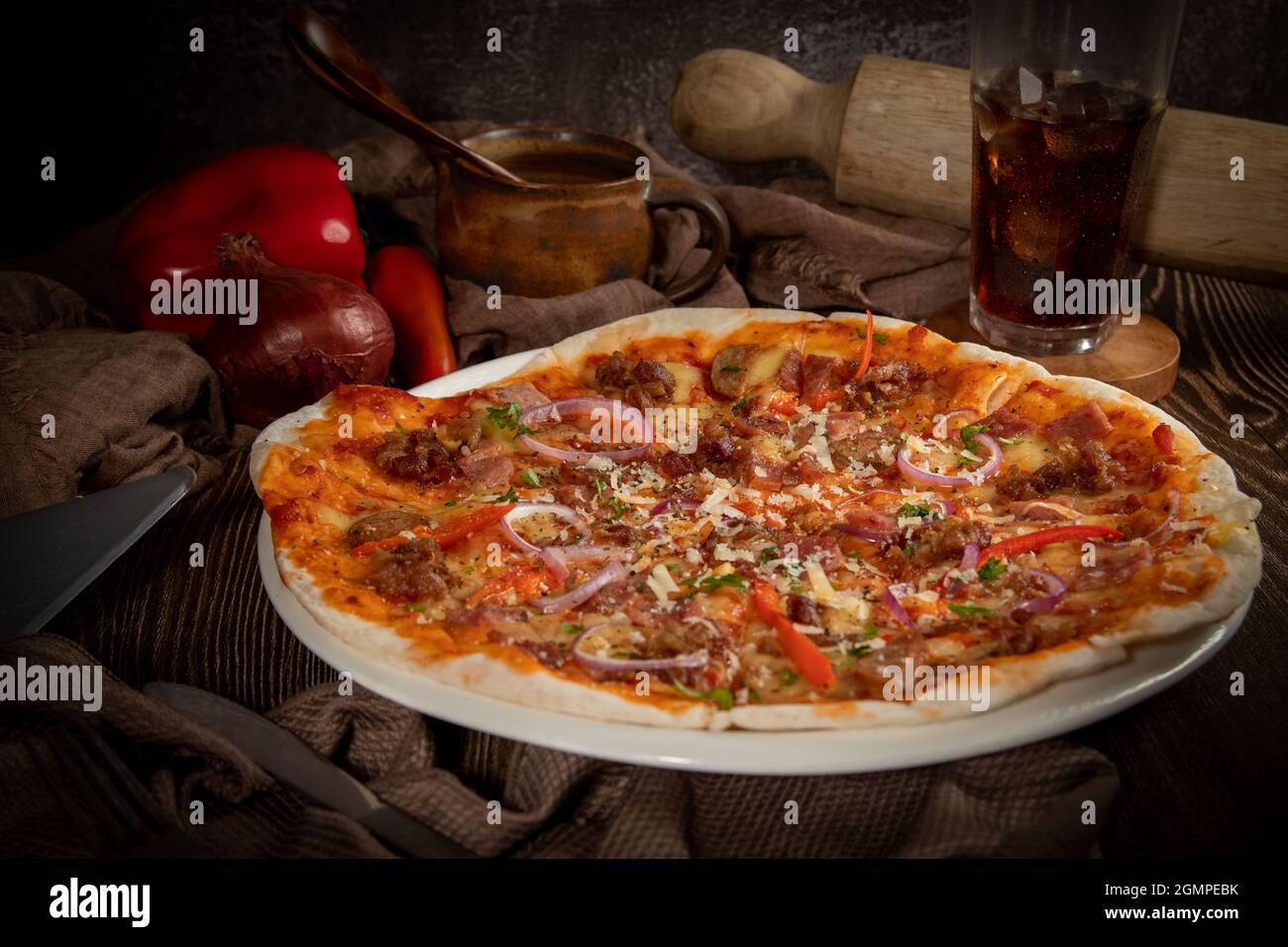 Italian tasty pizza in a kitchen Stock Photo - Alamy