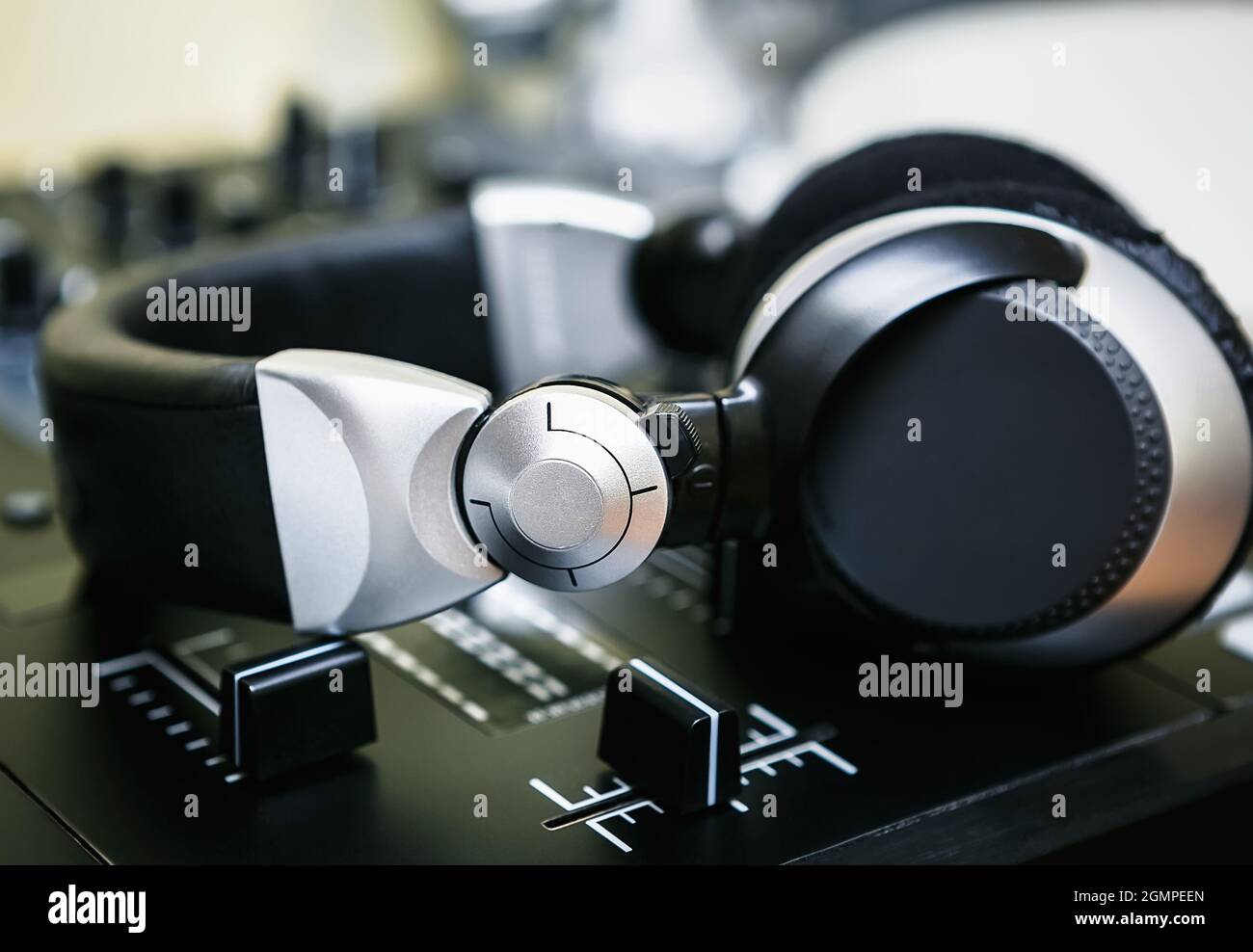 Dj headphones on sound mixer. Professional disc jockey head phone set ...