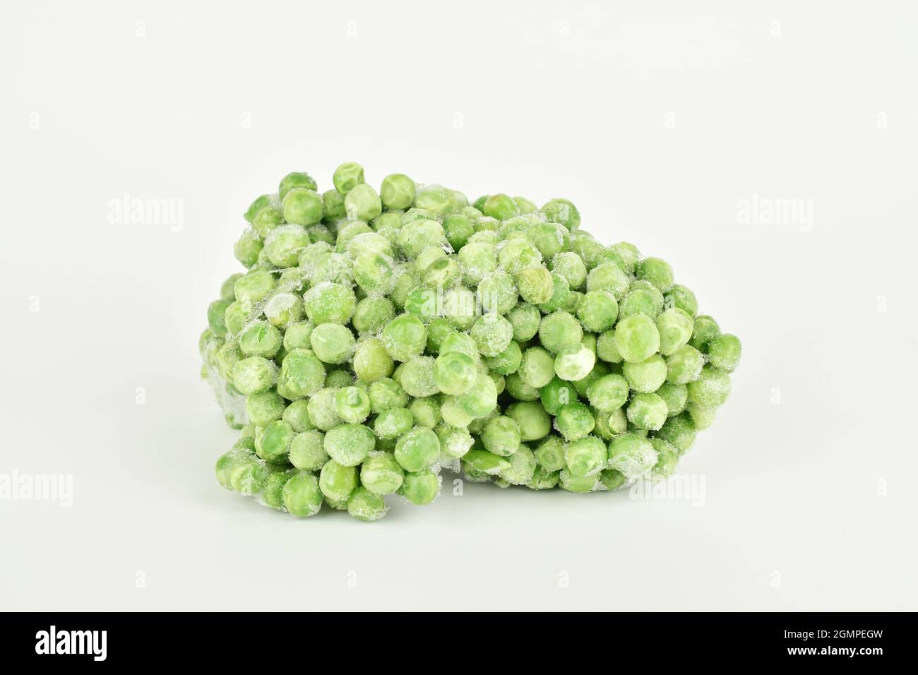 stack of frozen peas Isolated on white background Stock Photo - Alamy
