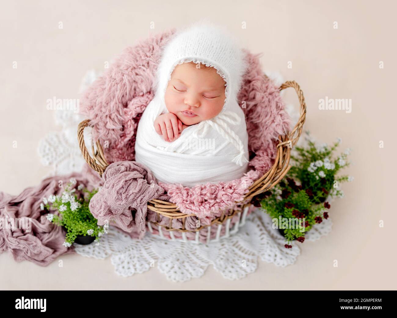 Newborn girl photoshoot Stock Photo - Alamy