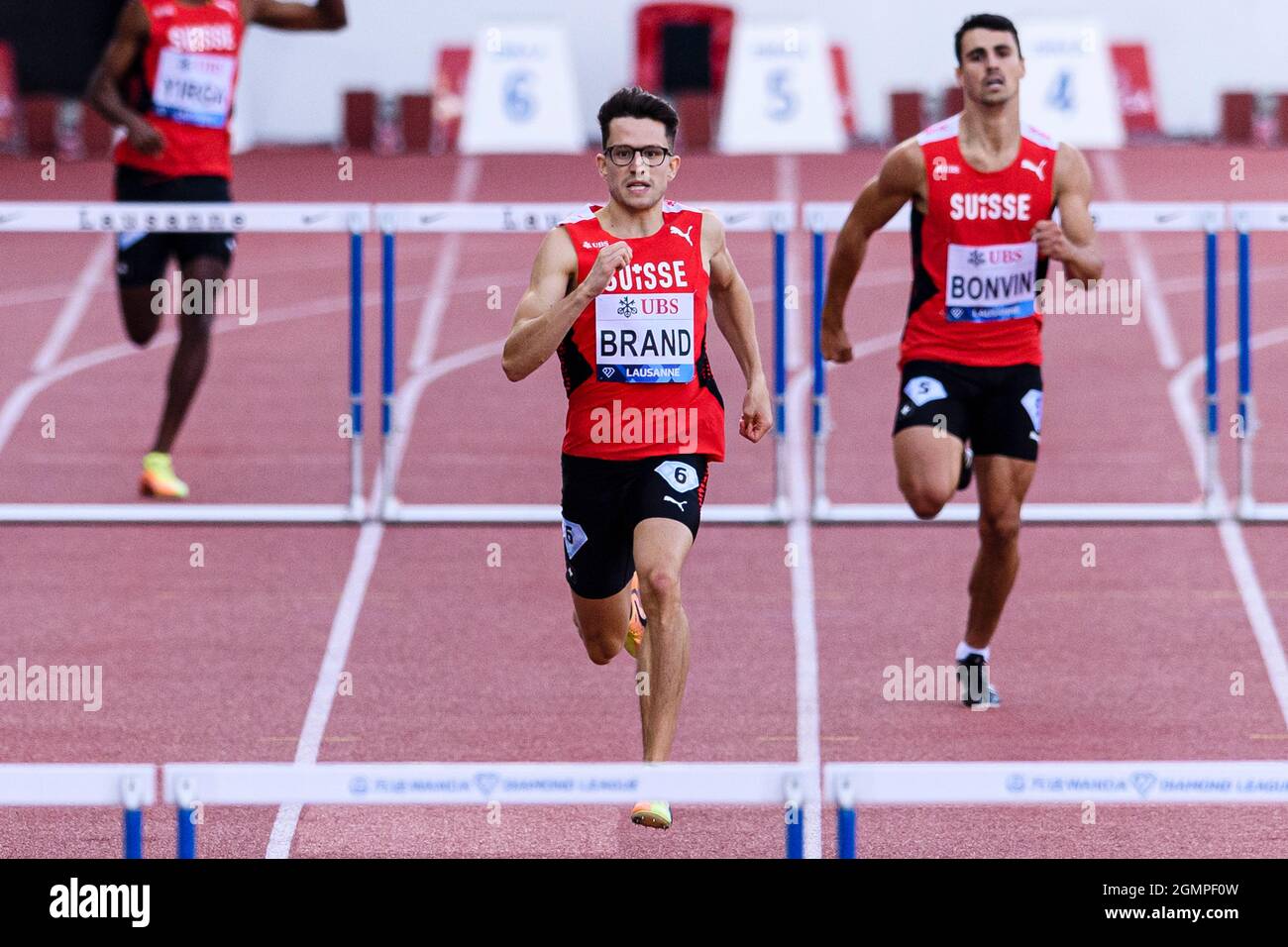 LAUSANNE, SWITZERLAND - AUGUST 26: Dany Brand of Switzerland (C) runs ...