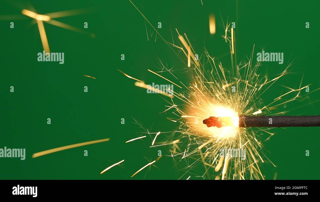Burning bengal fire sparkler Stock Photo - Alamy