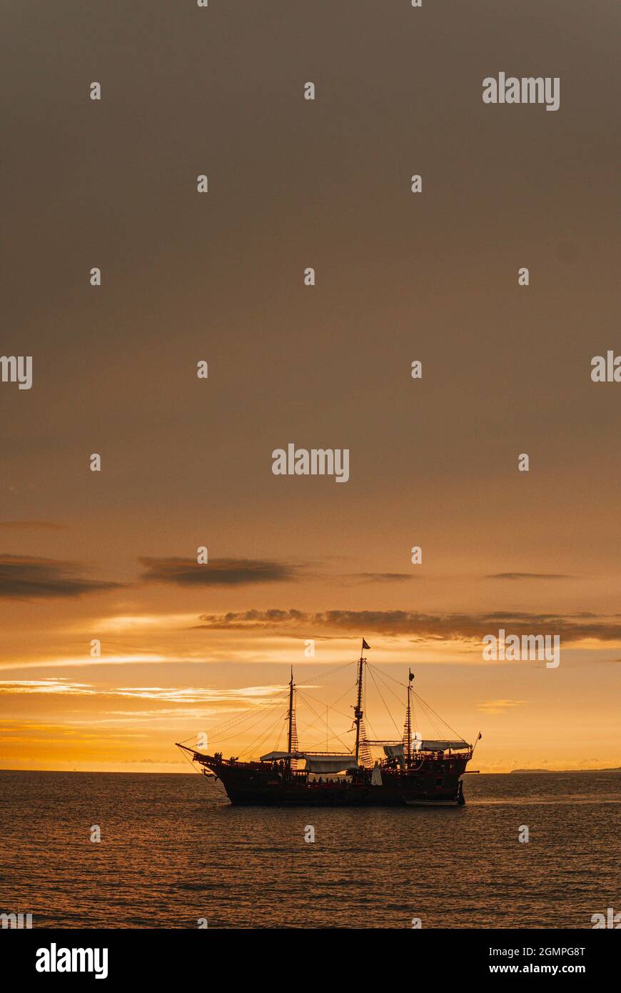 Ship at the sunset Stock Photo - Alamy