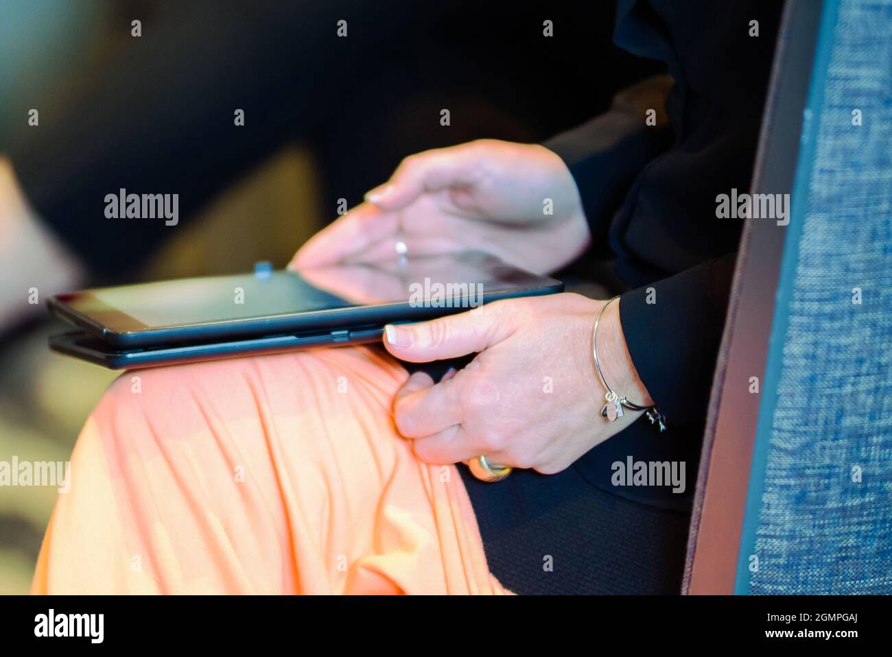 Hands in lap hi-res stock photography and images - Alamy