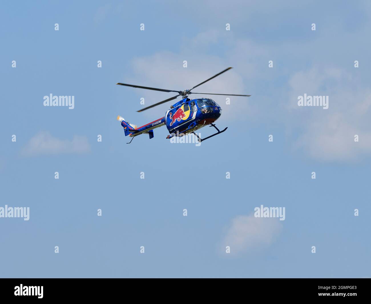 Helicopter Red Bull in flight Stock Photo - Alamy
