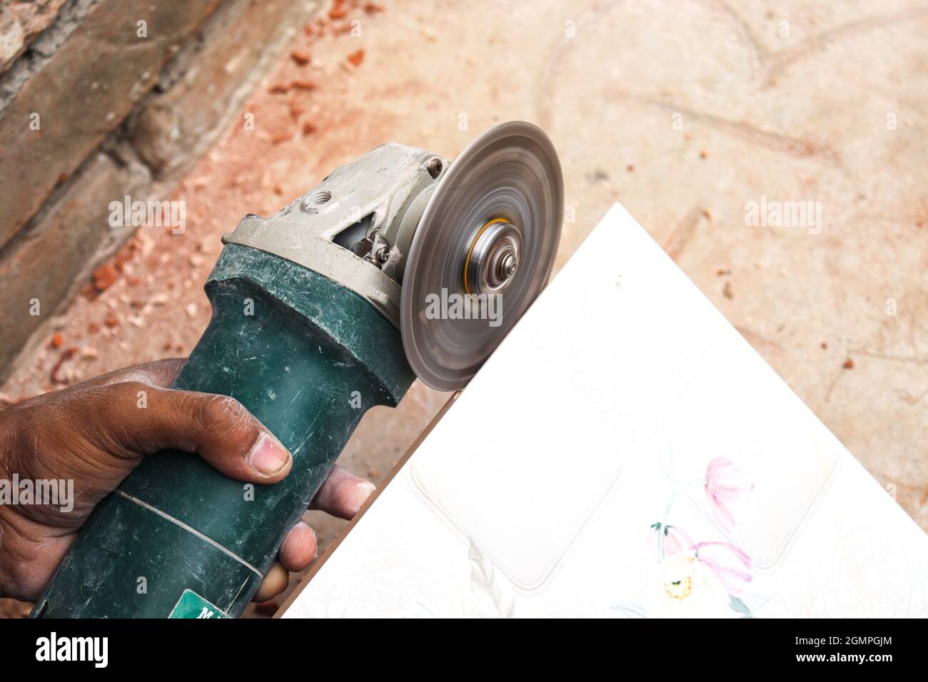 tile cutter machine with blade in house with worker Stock Photo - Alamy