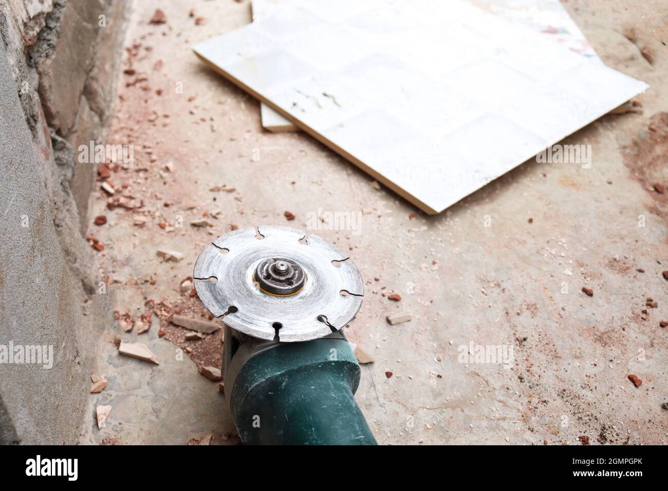 tile cutter machine with blade in house with worker Stock Photo - Alamy