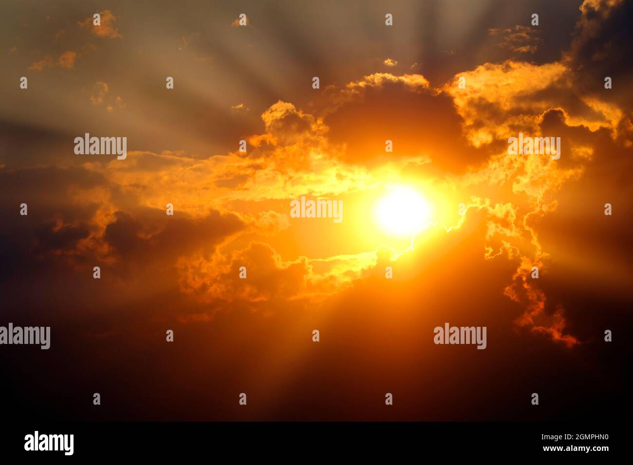 Sunlight sun rays shining through clouds in sky symbolizing hope and ...