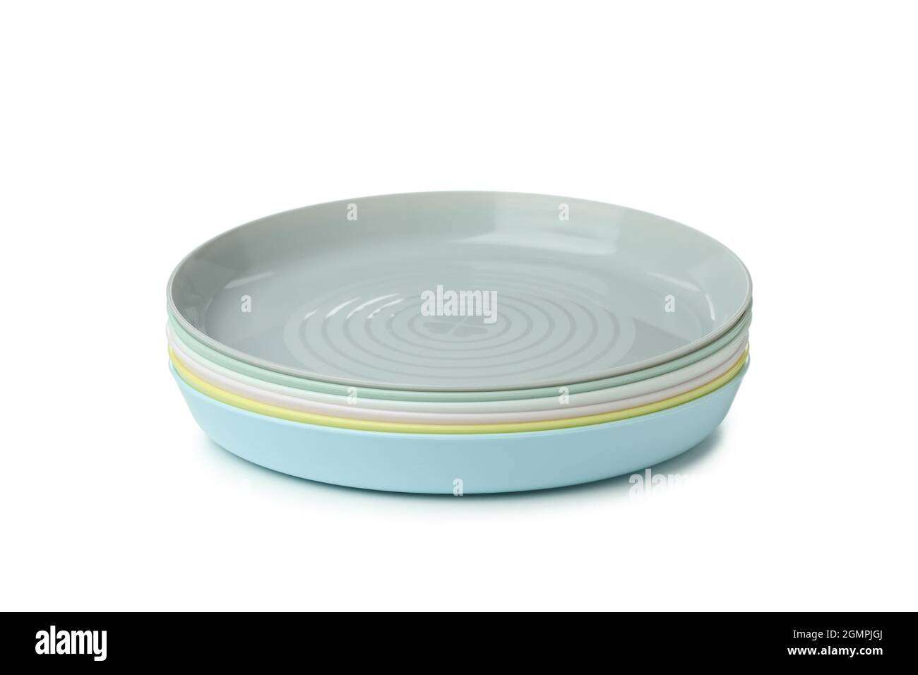 Colorful plastic plates isolated on white background Stock Photo - Alamy