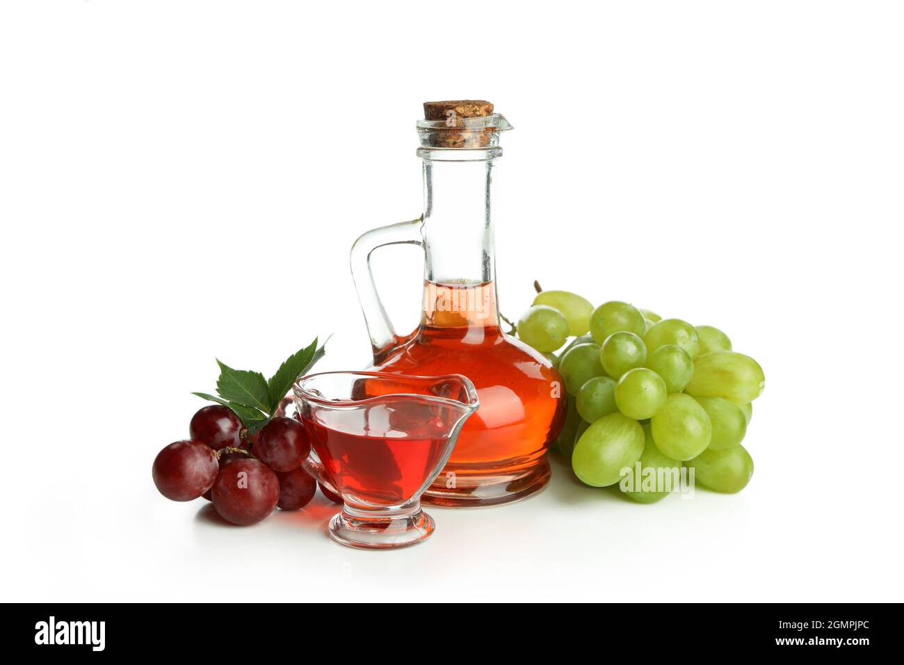 Vinegar and grape isolated on white background Stock Photo - Alamy