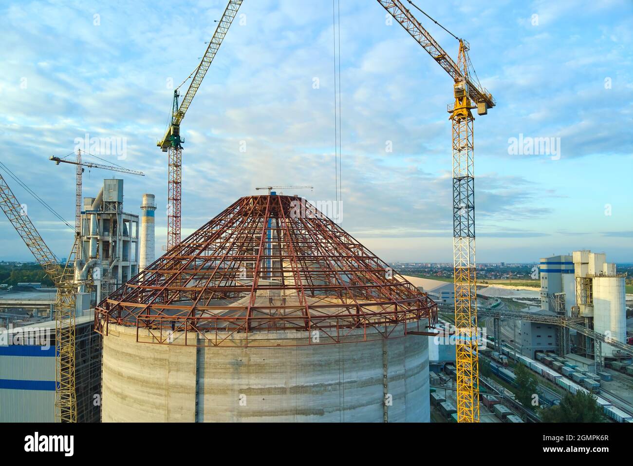 Aerial view of cement factory under construction with high concrete ...