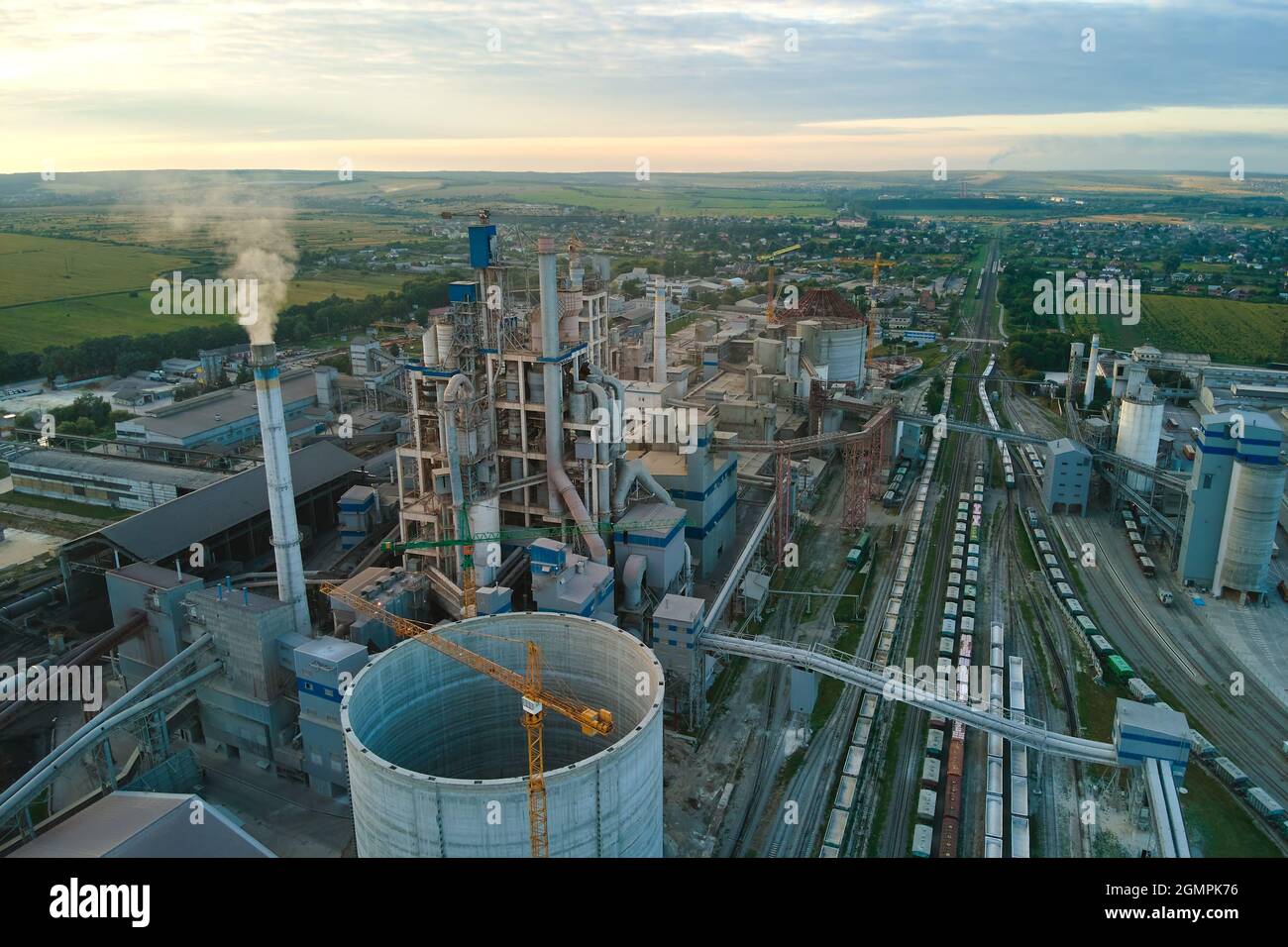 Aerial view of cement factory under construction with high concrete ...