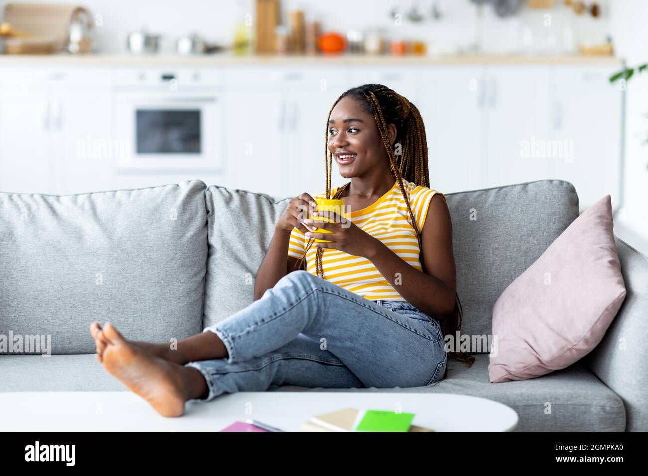 Relaxed black woman lying on hi-res stock photography and images - Alamy