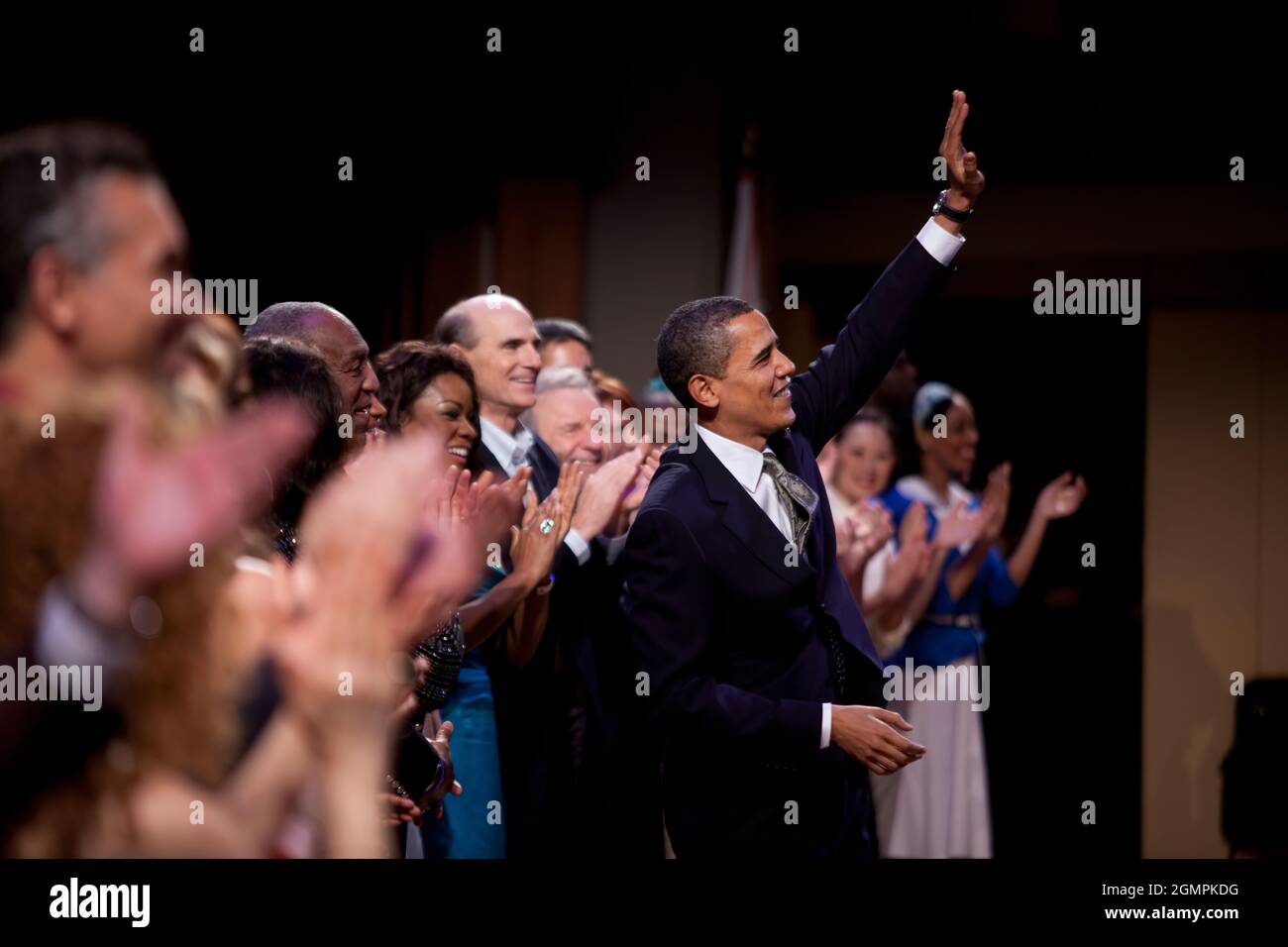 President Barack Obama waves at a musical birthday salute to Senator ...