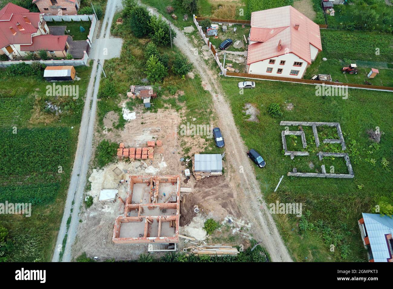 Top down aerial view of building works of new house concrete foundation ...