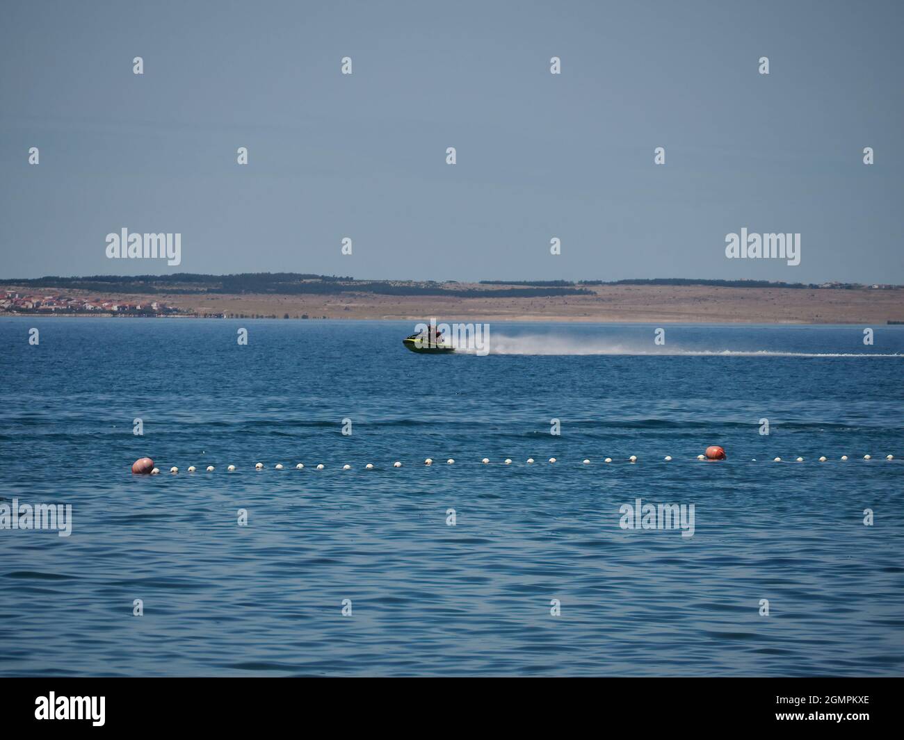 Scenic view of sea floaters on the surface of the water at summertime ...