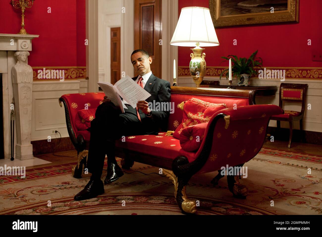 President Obama goes over notes in the Red Room prior to a Live Prime ...