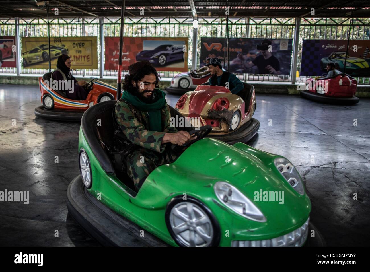 Kabul, Afghanistan. 20th Sep, 2021. A Taliban fighter drives a bumper ...