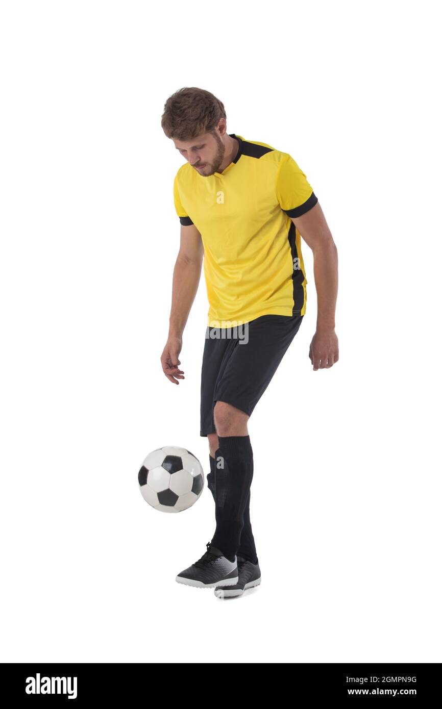 Caucasian soccer player man kicking ball isolated on white background ...