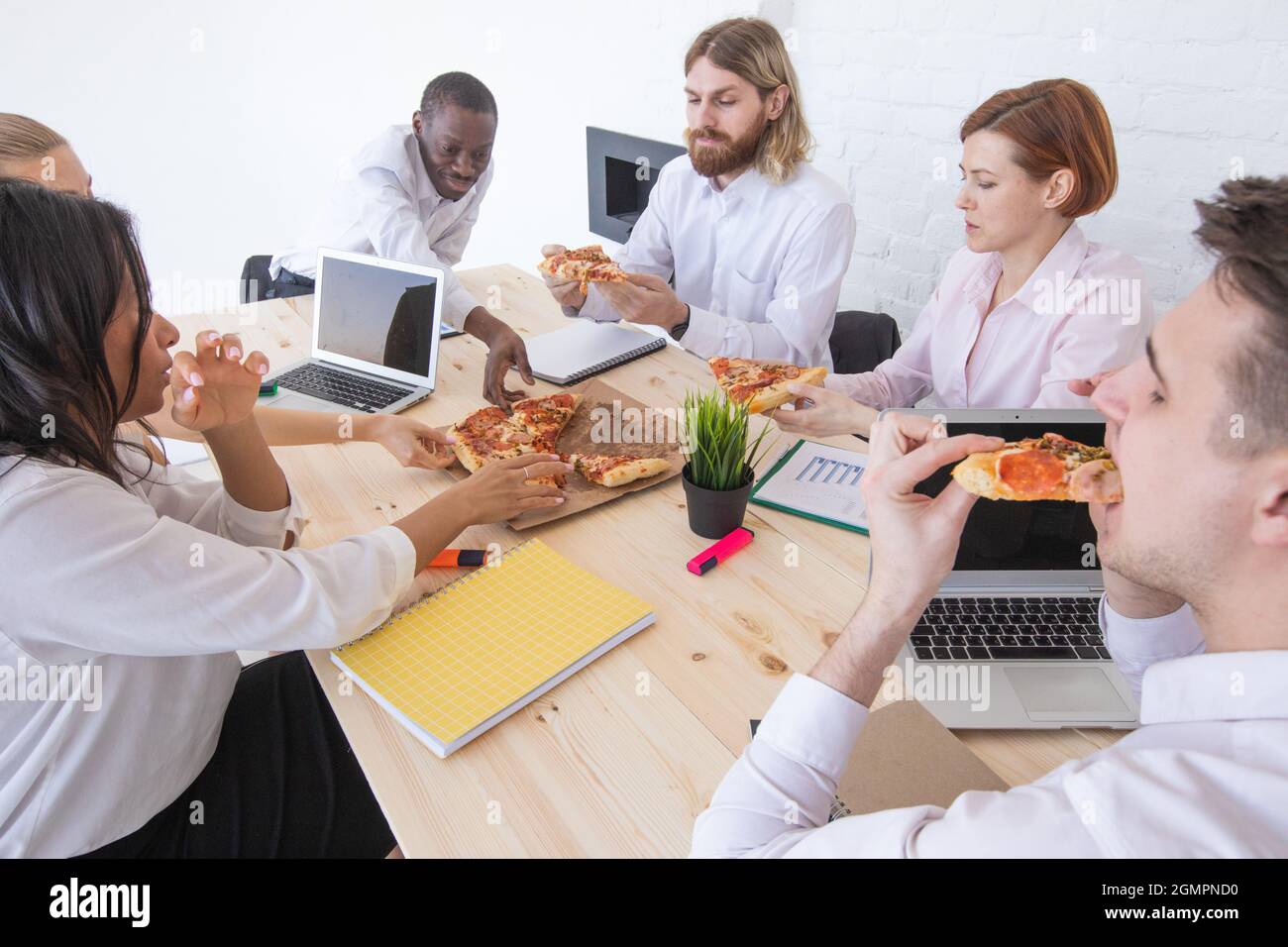 Happy Diverse Colleagues Have Fun At Lunch Break In Office Smiling
