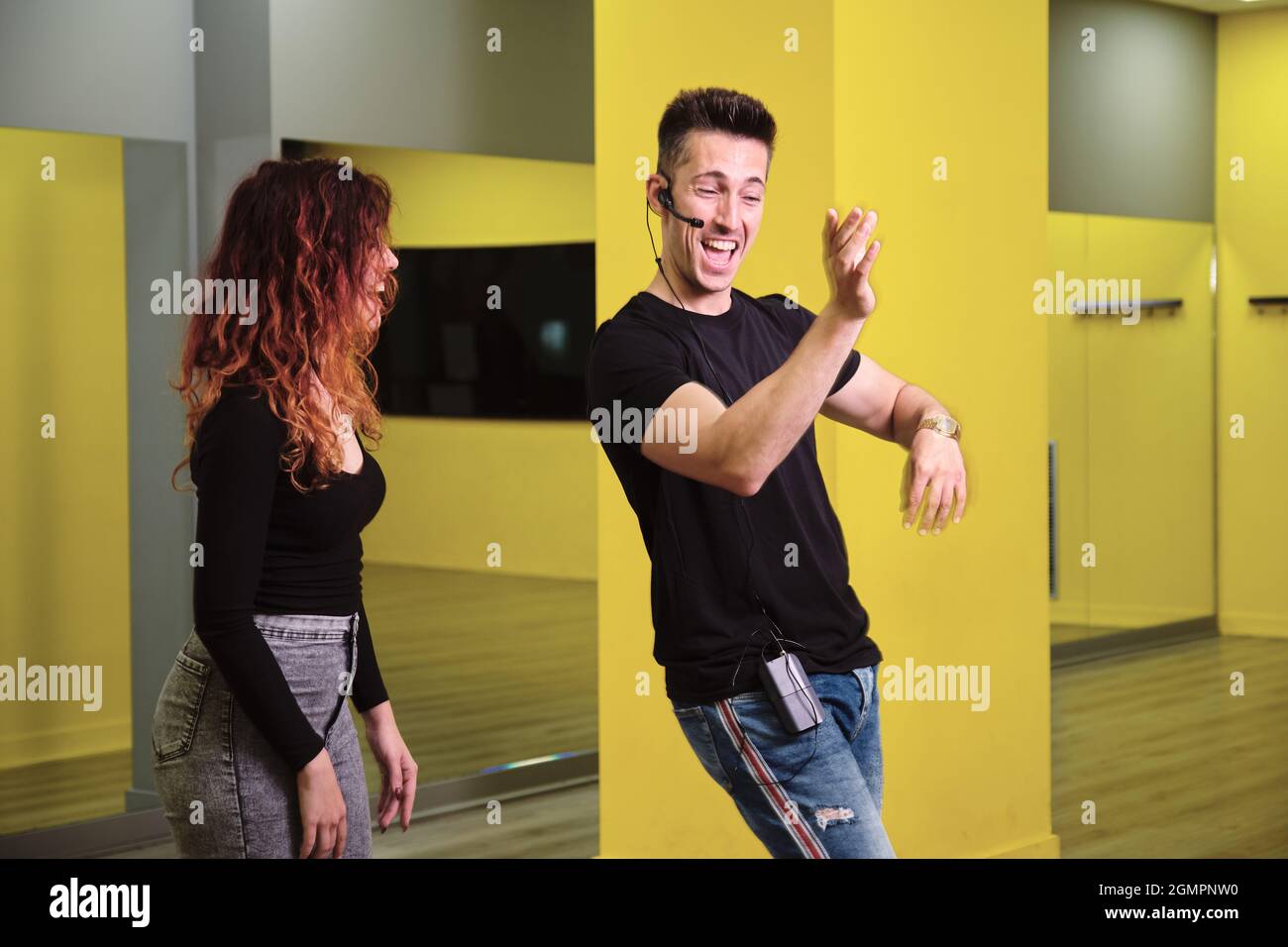 Salsa and bachata teachers in a class Stock Photo - Alamy