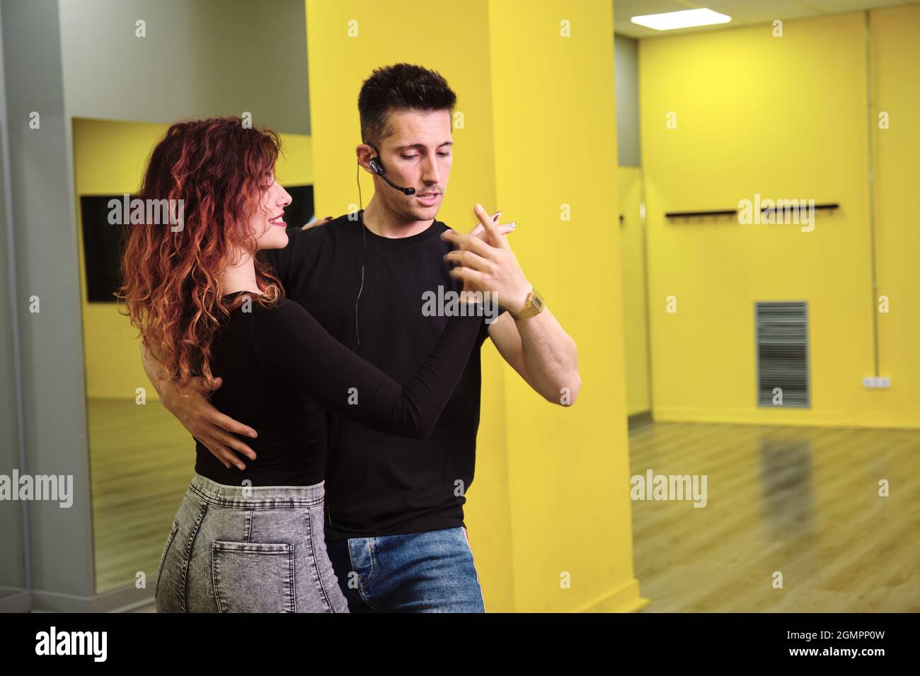 Salsa and bachata teachers in a class Stock Photo - Alamy