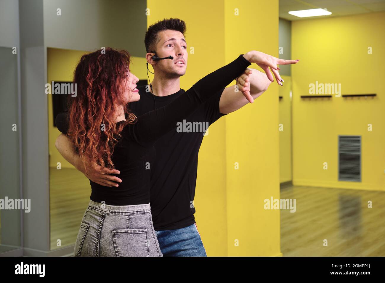 Salsa and bachata teachers in a class Stock Photo - Alamy
