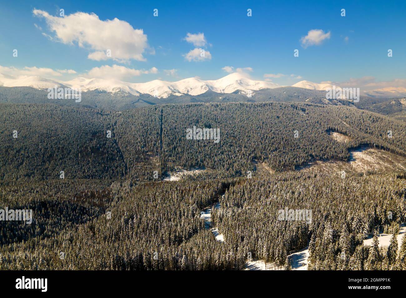 Aerial view of winter landscape with mountain hills covered with ...