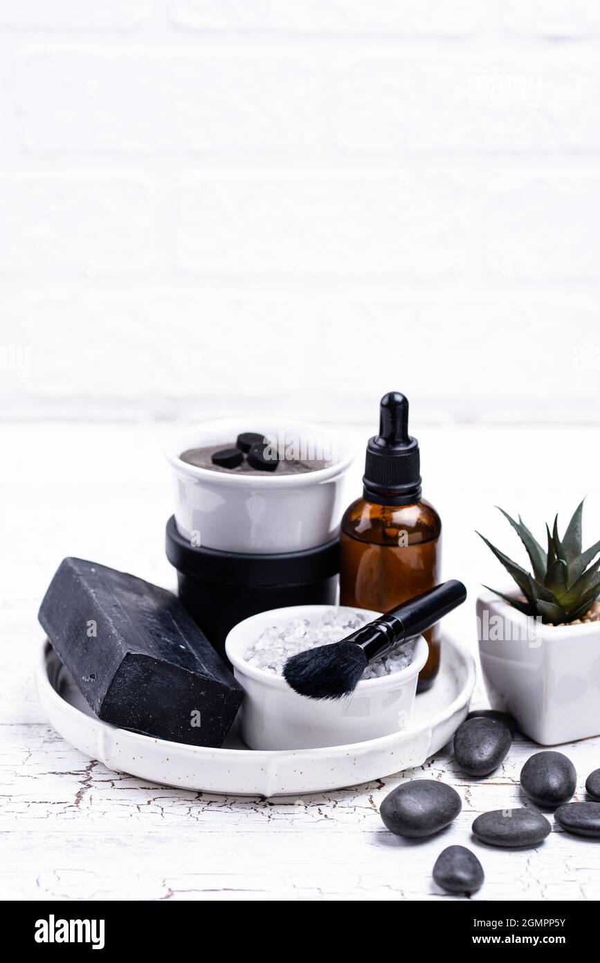 Set of black charcoal detox cosmetics Stock Photo - Alamy