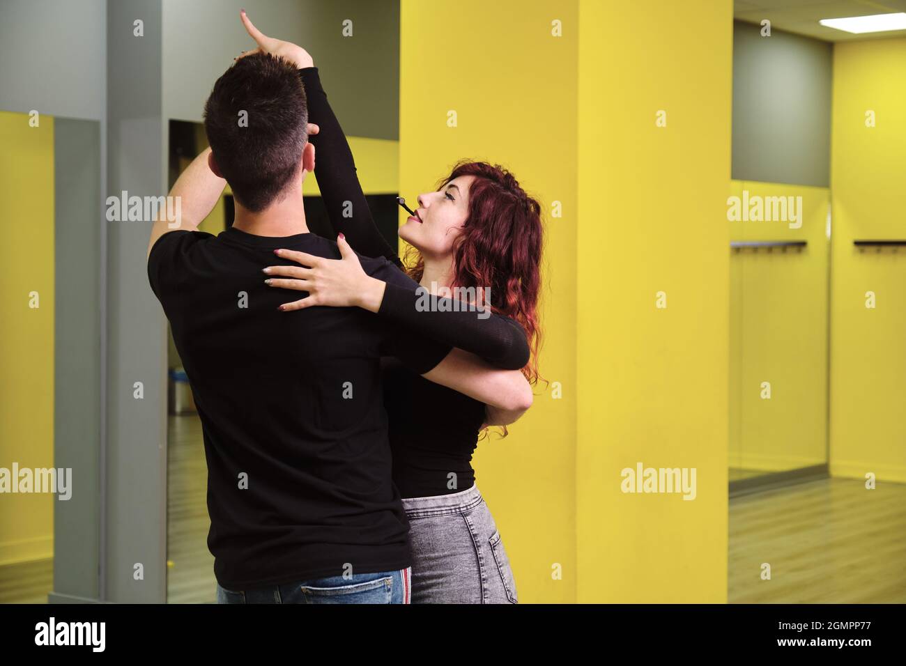 Salsa and bachata teachers in a class Stock Photo - Alamy