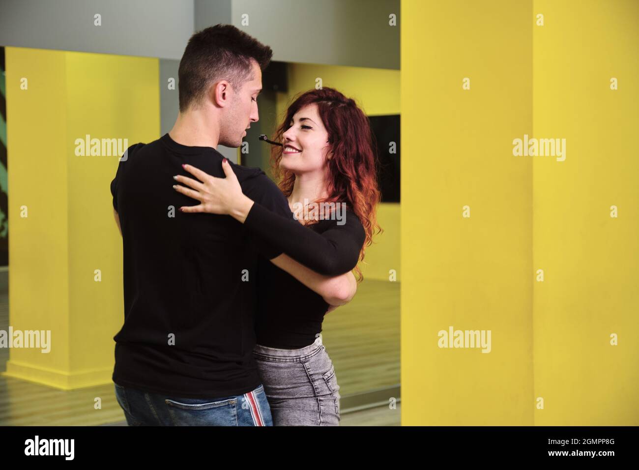 Salsa and bachata teachers in a class Stock Photo - Alamy