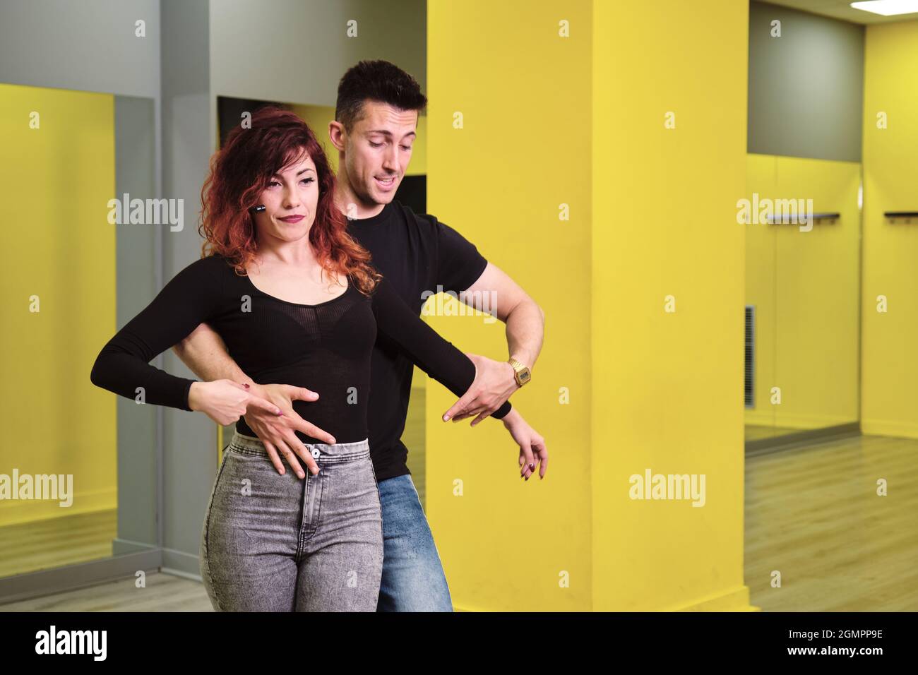 Salsa and bachata teachers in a class Stock Photo - Alamy