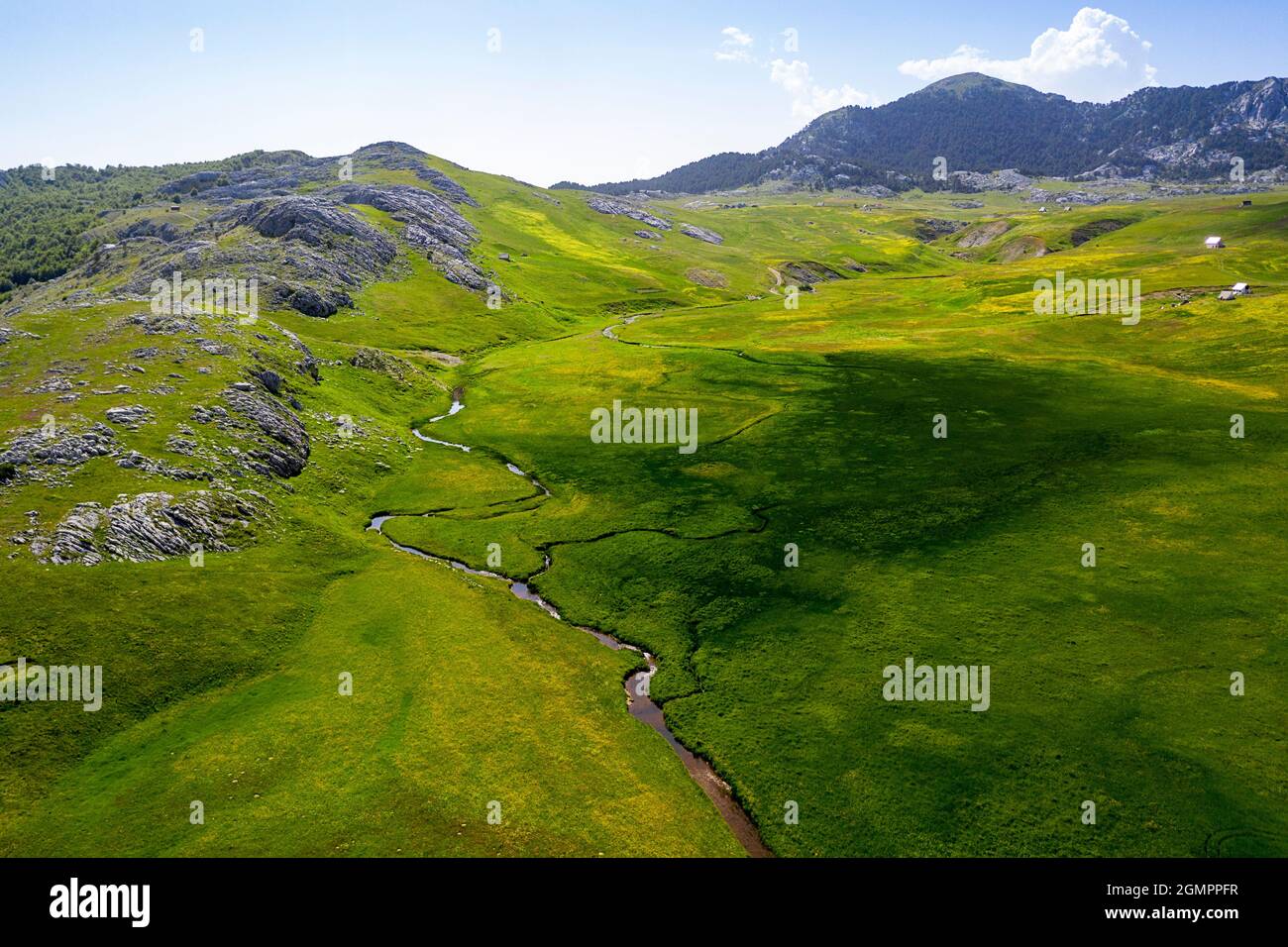 aerial view of a beautiful Lukavica plateau and grass meadow with small ...