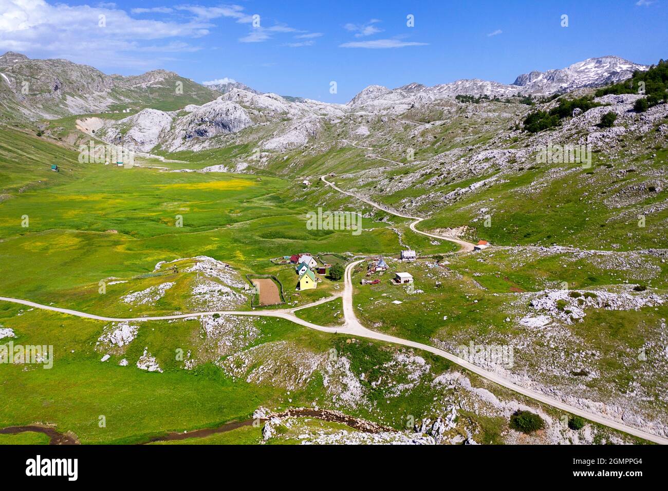 aerial view of a beautiful Lukavica plateau and grass meadow full of ...