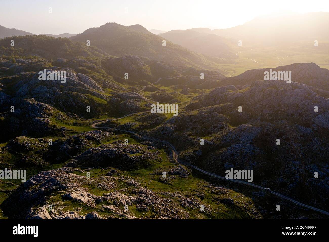 Aerial view of a road from Lukavica plateau to Kapetanovo lake at the ...