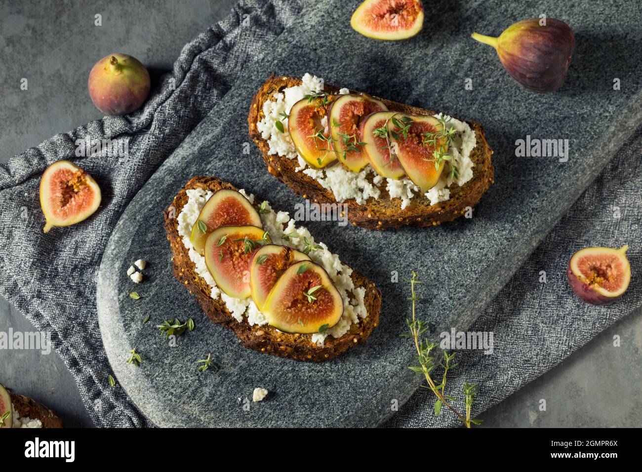 Healthy Homemade Fig Breakfast Toast with Goat Cheese and Herbs Stock ...