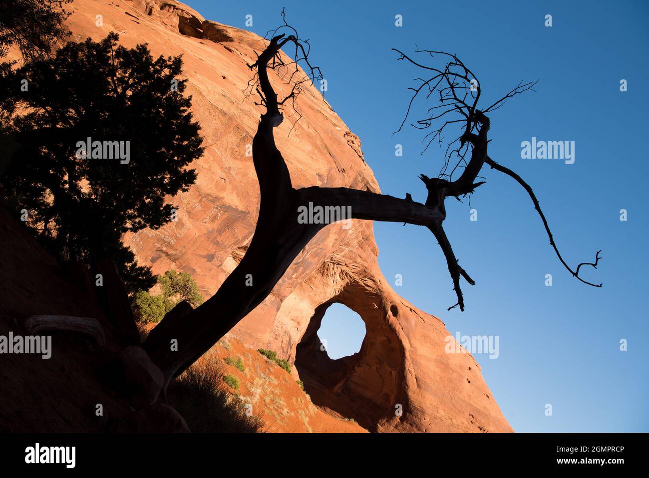 Ear-of-the-Wind Utah arch giant sized hole in rock face at Stock Photo ...
