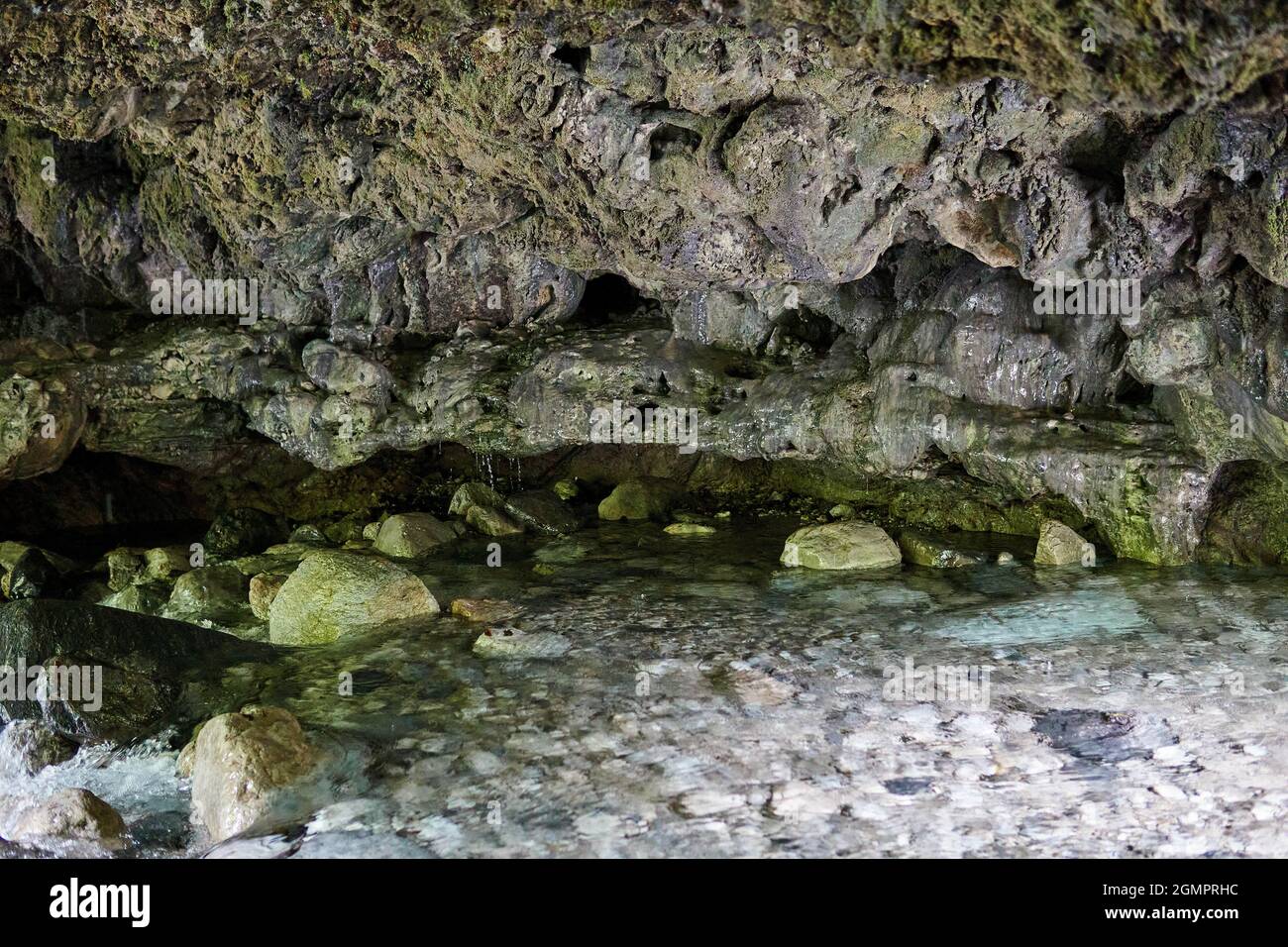 Closeup of water flowing in a cave Stock Photo - Alamy